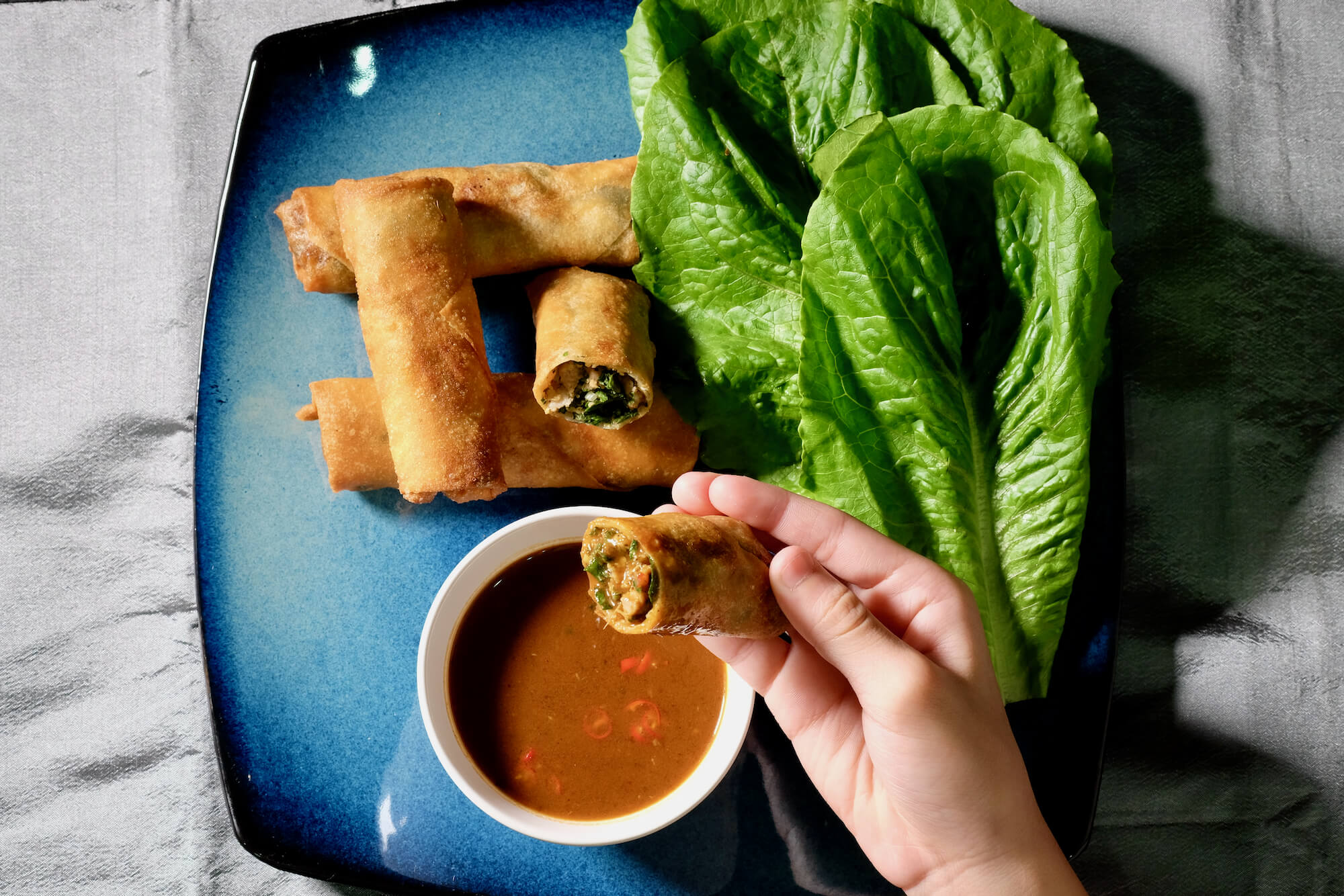 Duck and herb spring rolls. Very special dipping sauce. - delectabilia