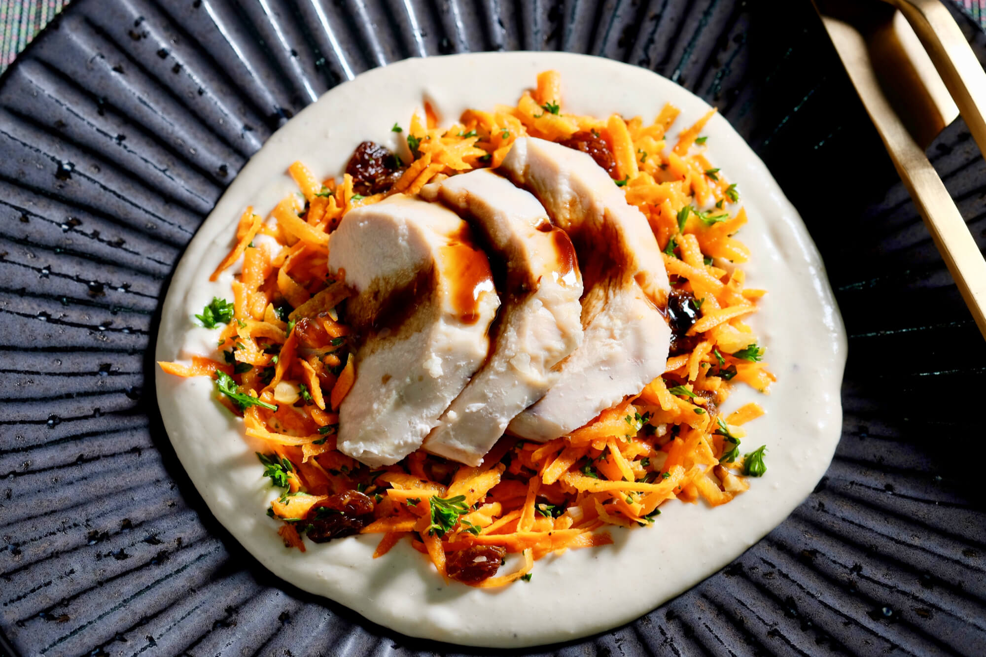 Carrot raisin salad on roast garlic white bean puree. Sous-vide chicken ...