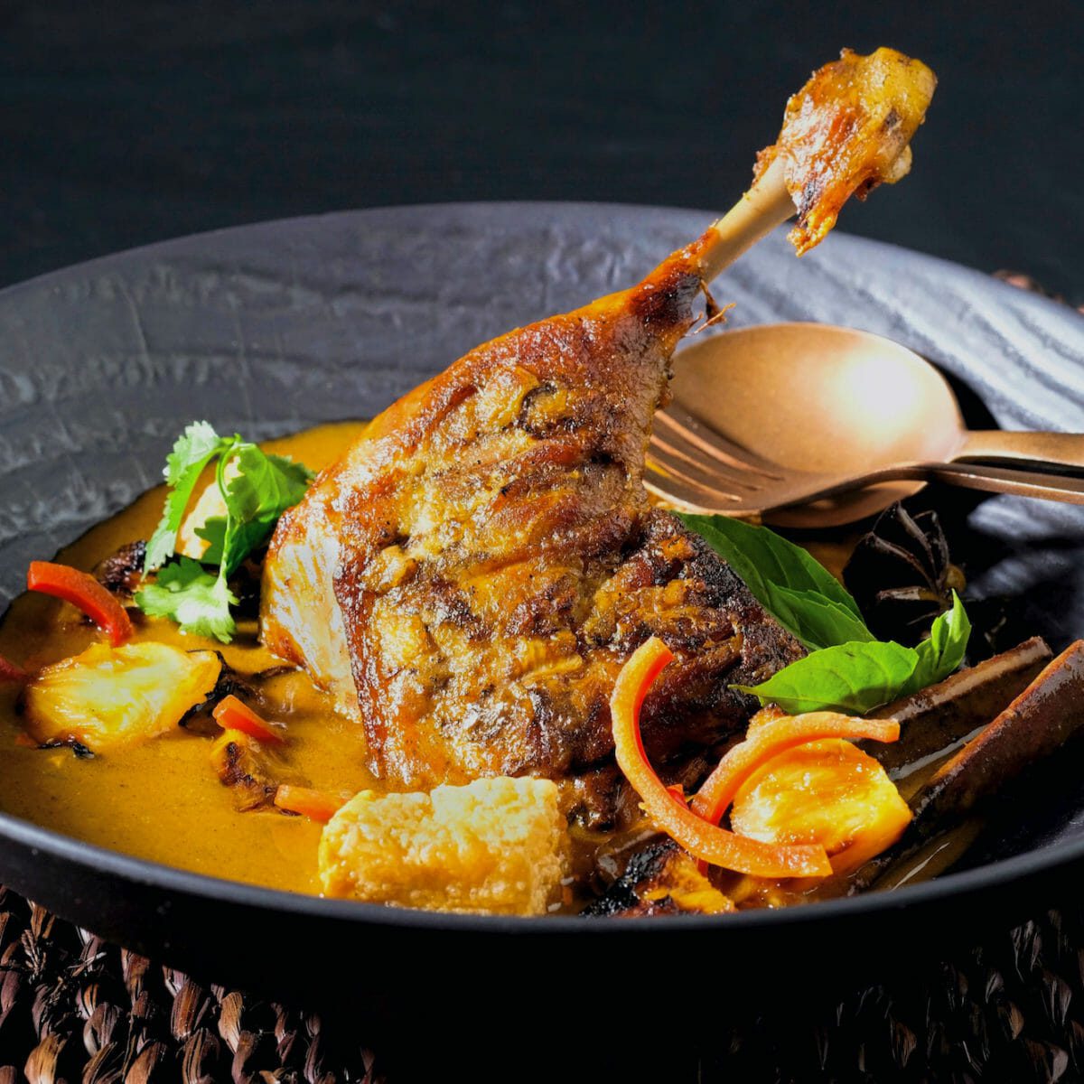 Massaman Curry with Confit Duck Leg and Charred Pineapple - delectabilia
