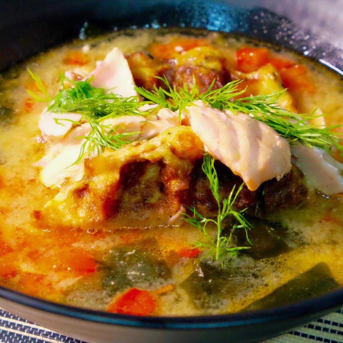 Salmon poached in miso dashi with leeks and baby carrots - delectabilia